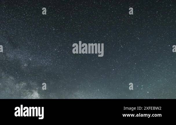 Milky way galaxy stars moving in dark starry night sky background ...