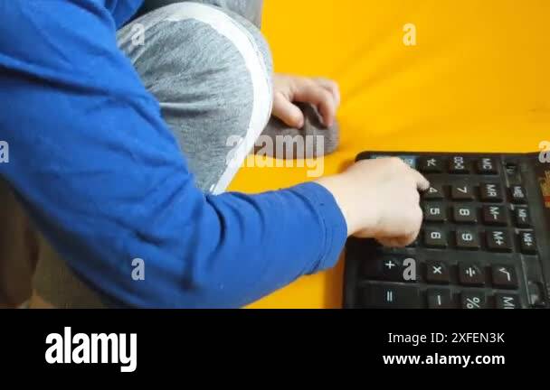 Child hands with calculator counting during school homework. Kid ...