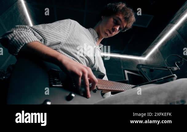 low shot in the recording room equipment the sound of music a handsome ...