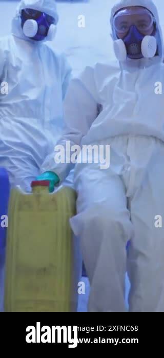 Investigation, team and inspectors in ppe for hazard at drug lab for ...