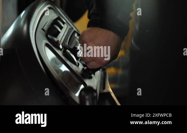 close-up Starting the engine by turning the key in the ignition lock ...