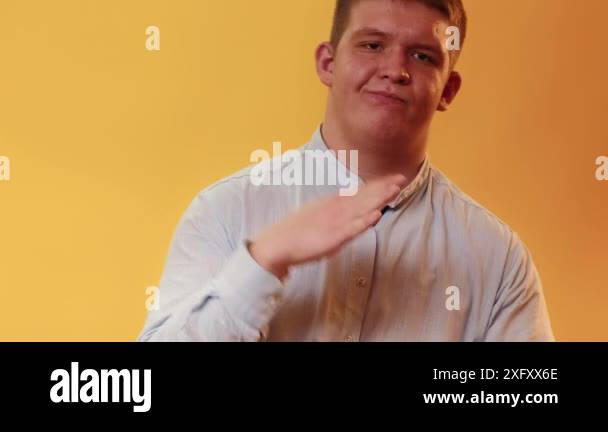 Stop signal. Refusing no. Chubby overweight red-haired guy showing ...