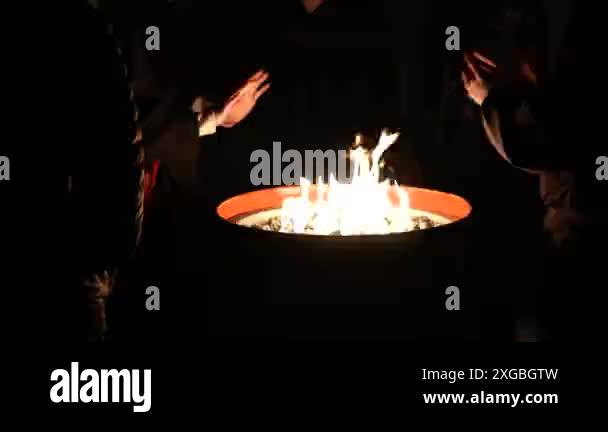 People around a fire Stock Videos & Footage - HD and 4K Video Clips - Alamy
