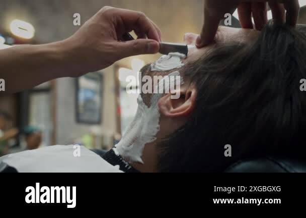 Barber shaving mans face Stock Videos & Footage - HD and 4K Video Clips ...