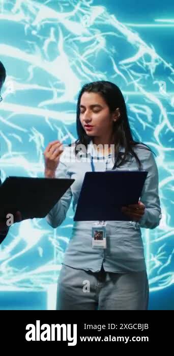 Vertical video AI researcher and coworker working with artificial ...