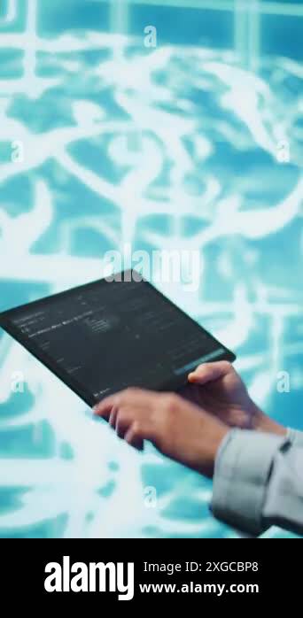 Vertical video Engineer uses tablet and AI deep neural networks modeled after human brain to ...