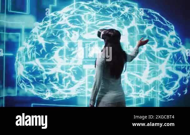 Developer wearing VR headset looking at hologram of artificial intelligence human brain ...