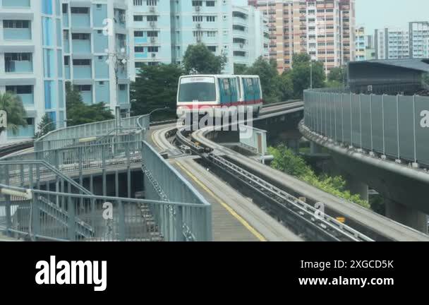 Singapore-29 Jun 2024: Self Driving Light Rapid Transit LRT on elevated ...