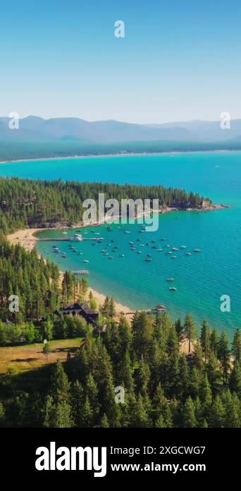 Amazingly turquoise color of the Lake Tahoe with lots of boats at the ...