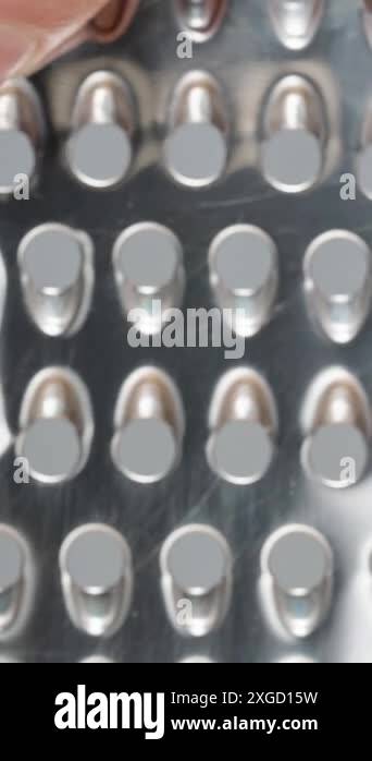 Vertical video. Man Showing Fresh Coconut Pulp and Starting to Grate It ...