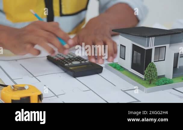 Engineer architect working house model Stock Videos & Footage - HD and ...