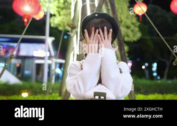 Slow-motion video of a young and cute Taiwanese woman in her 20s ...