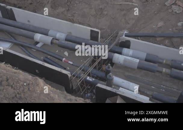 Durable pipelines in trench secured by cement blocks at wastewater ...