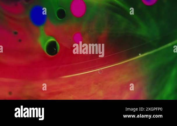 Paint oil bubbles. Color mist. Ink water mix. Defocused bright red ...