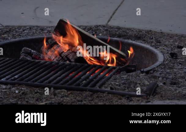 Cooking over open pit fire Stock Videos & Footage - HD and 4K Video ...