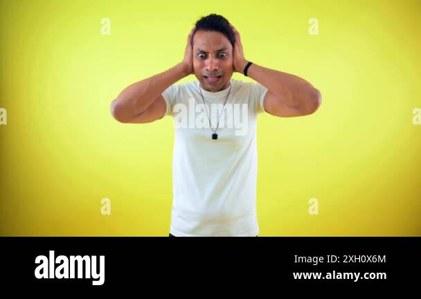Frustrated man covering ears, Young person crying sadly, An anxious men ...