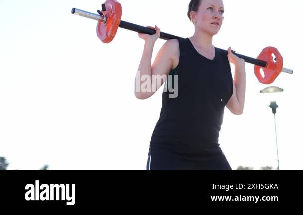 Woman lifting red weight bar Stock Videos & Footage - HD and 4K Video ...