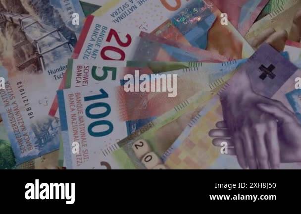 Swiss Francs And The Numbers 2024 On Dice Stock Video Footage - Alamy