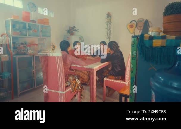 Women sitting around kitchen table Stock Videos & Footage - HD and 4K ...