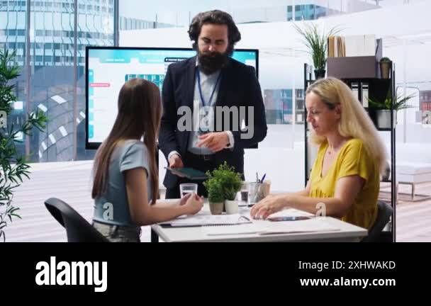 Employee choking in office, being helped by quick thinking coworker ...