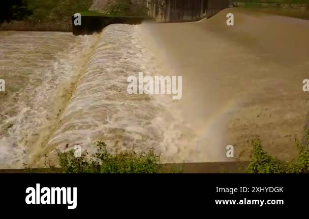 The dam's water is brown: This dam's water is brown because of very ...