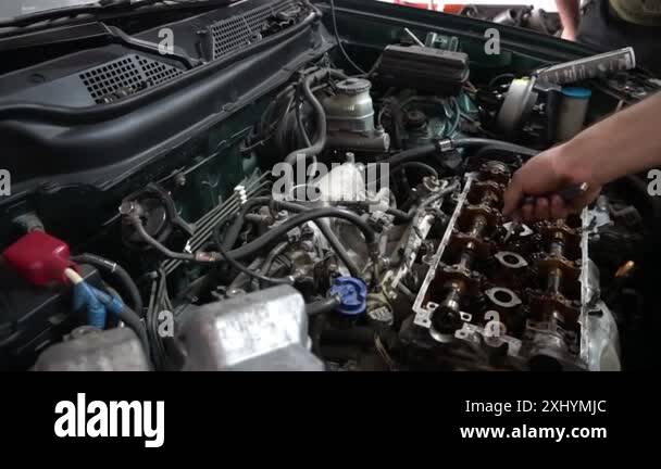 Mechanic works engine car Stock Videos & Footage - HD and 4K Video ...