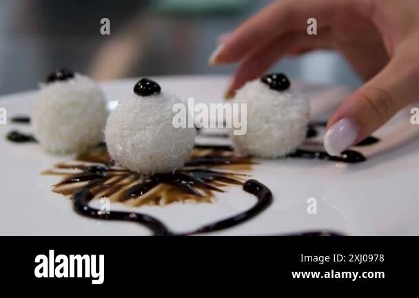 Coco balls in plate Stock Videos & Footage - HD and 4K Video Clips - Alamy