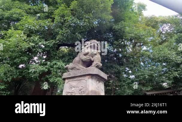 Asagaya Shinmei-gu Guardian lion dog within the grounds.Asagaya Shinmei ...