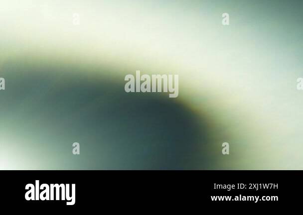 A cinematic arc-shaped light flare, complemented by a shining flare on ...