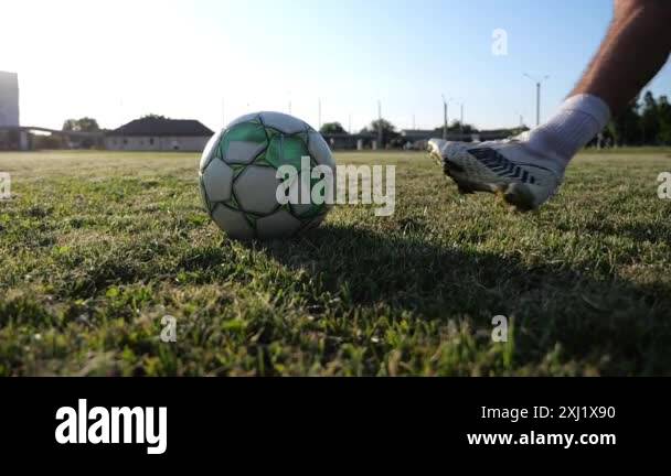 Male foot of professional footballer shooting a penalty kicks on ...