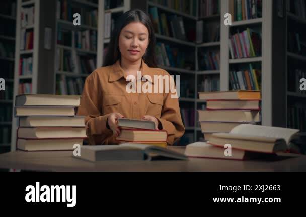 Bookworm bookshelf Stock Videos & Footage - HD and 4K Video Clips - Alamy