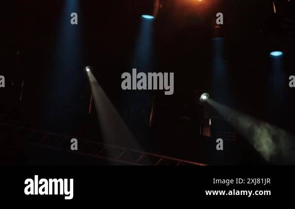 Stage Spotlight with Laser rays. Bright shiny lights flashing movement ...