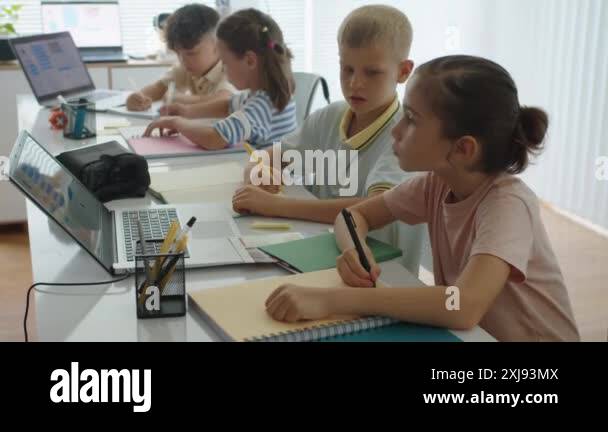 Using laptops at school Stock Videos & Footage - HD and 4K Video Clips ...