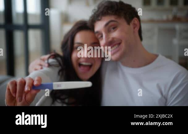 Happy pregnant couple medical insurance health parents smiling excited ...