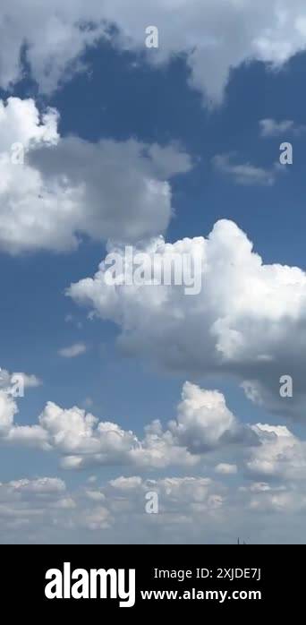 Blue sky white clouds. Puffy fluffy white clouds. Cumulus cloud cloudscape timelapse. Summer ...