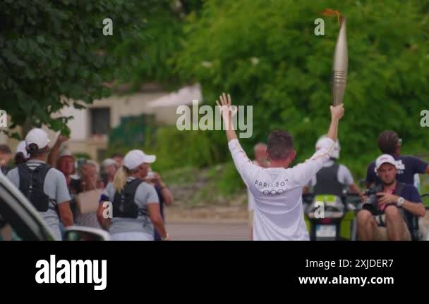 Migennes, France, 11 July, 2024: Olympic Flame passing through Yonne ...