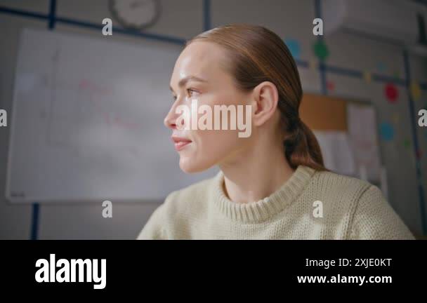 Friendly girl working school at light day closeup. Smiling young ...