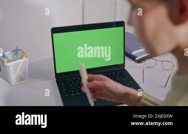 Tutor checking notes mockup laptop workplace closeup. Unrecognizable ...