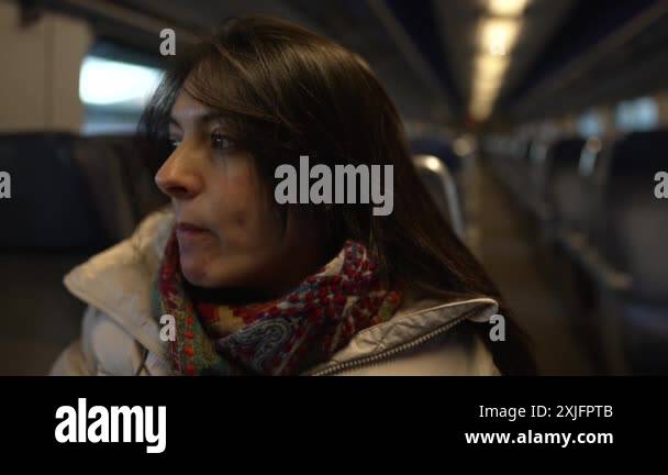 Woman Eating A Snack On A Train Ride - Passenger Enjoying Food While ...