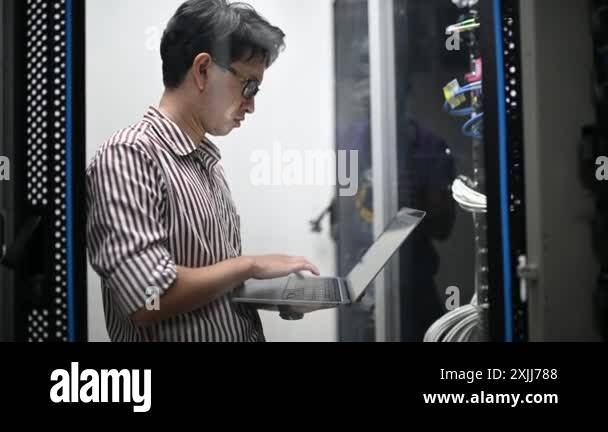 Technician setting up network Stock Videos & Footage - HD and 4K Video Clips - Alamy