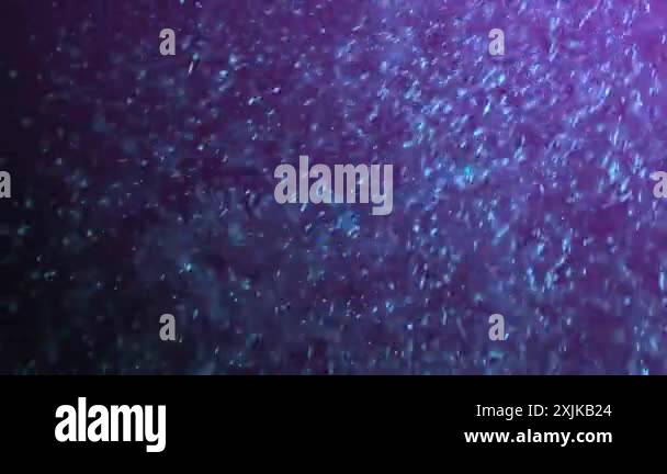 Animation of blue light spots on purple background. Shapes, colours ...