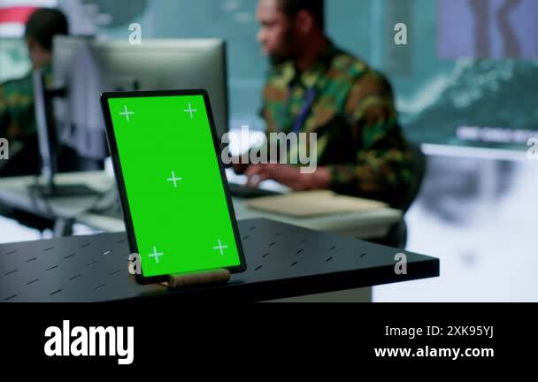 US soldiers working in a top secret operation room with copy space on ...