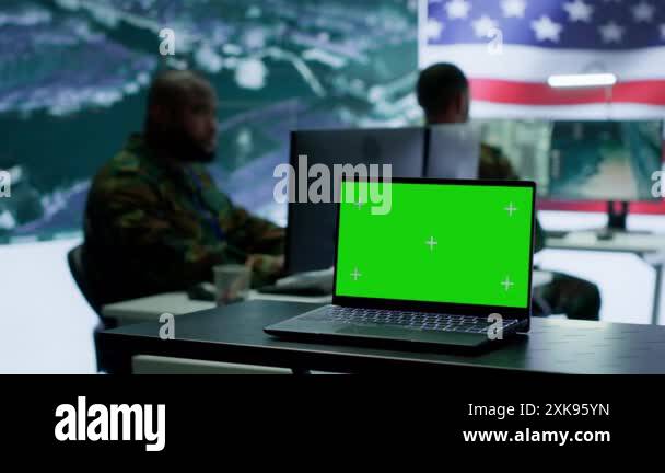 American army working in a command post with green screen, soldiers ...