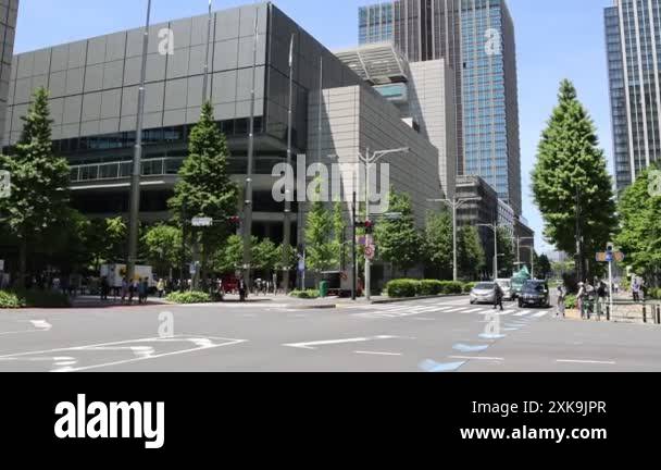 Tokyo, Japan- 11 May 2024: Marunouchi District modern office skyscraper ...