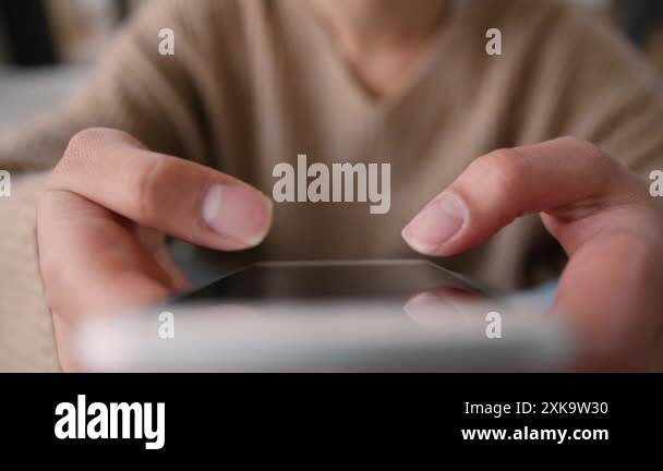 POV point of view touching screen mobile phone hands close up typing ...