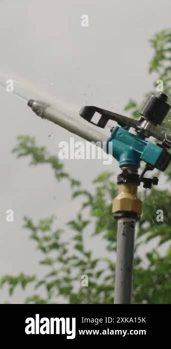 Vertical video. The Principle of Operation of a Sprinkler System ...