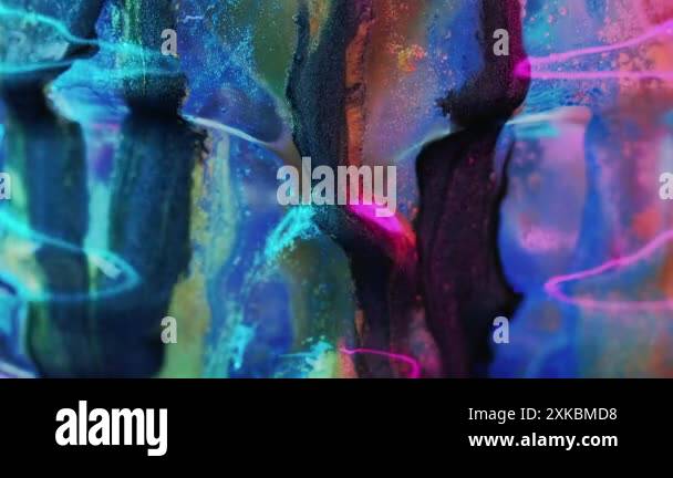 Glitter ink drip. Paint spill. Defocused neon light blue pink golden ...