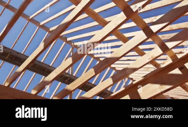 During construction of new home, wooden frame beams are used to ...