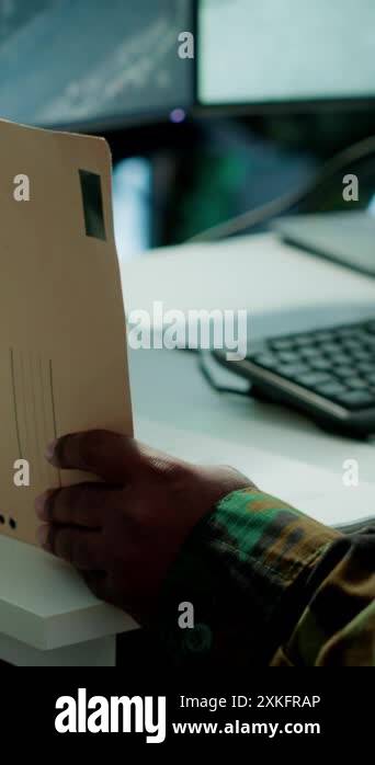 Vertical Video Military Personnel Operating In A Secure Office Environment Processing Critical