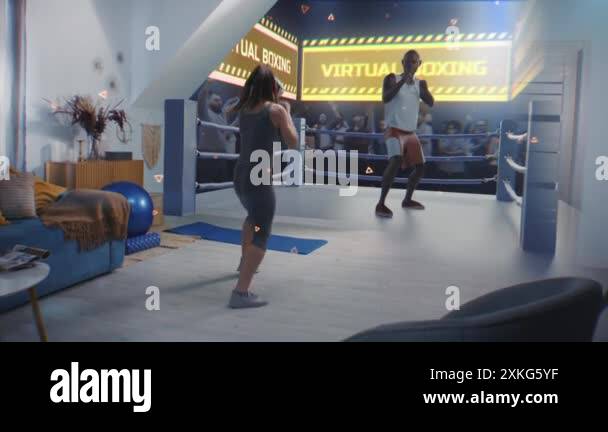 Female athlete wearing augmented reality headset starts boxing training ... Female athlete wearing augmented reality headset starts boxing training ...